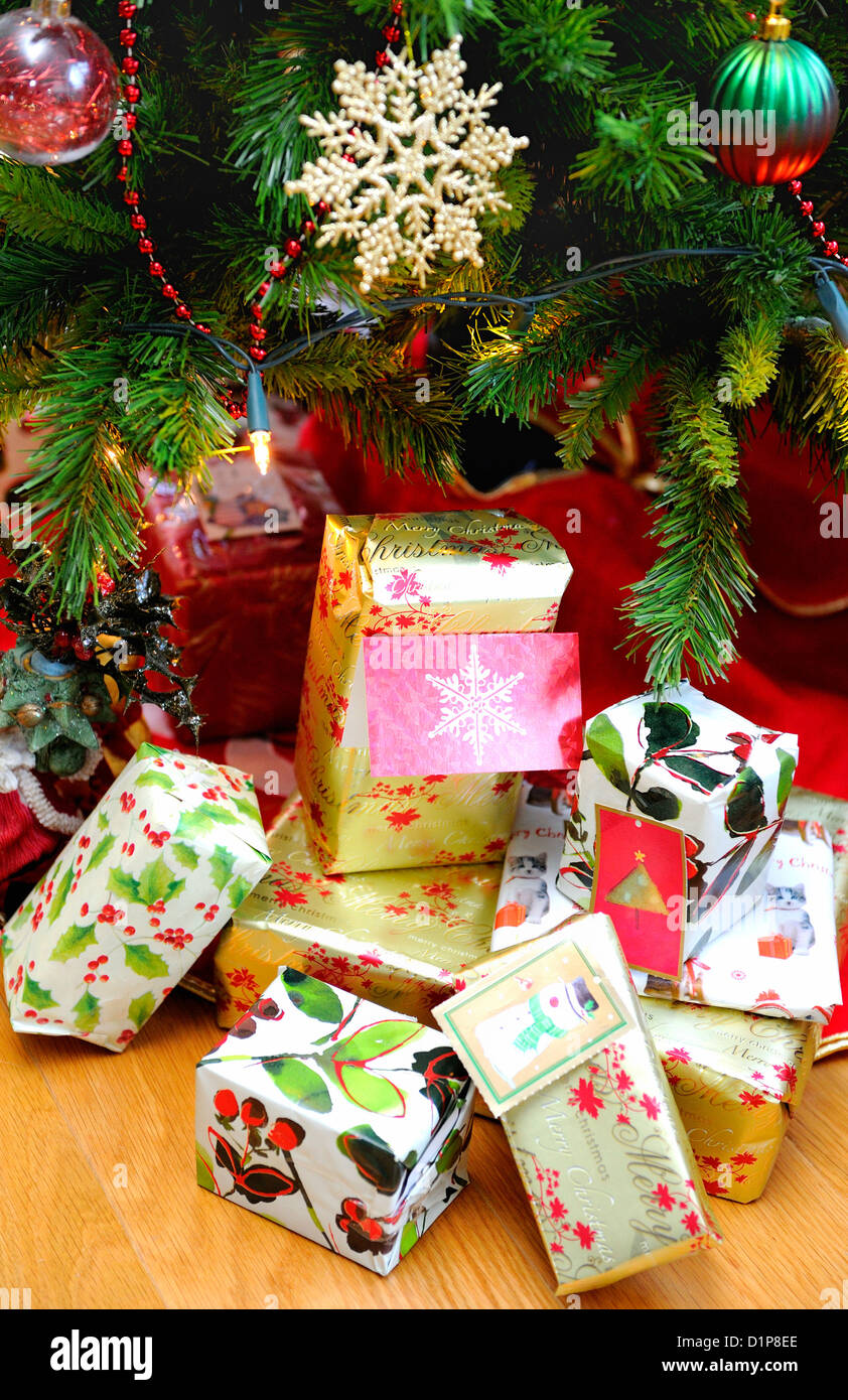 Presents wrapped and under a christmas tree hi-res stock photography ...