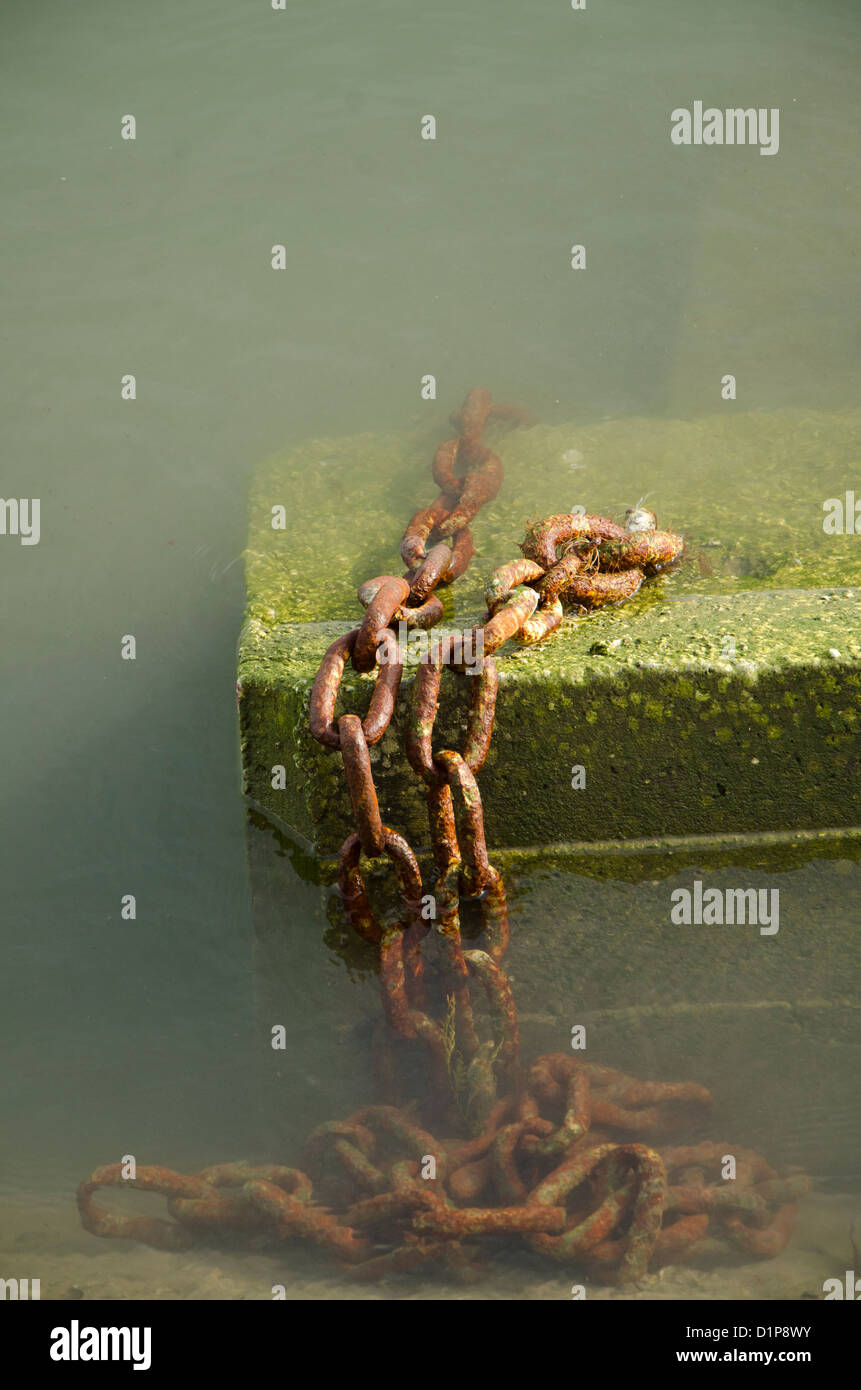 Rusty Chain in water for boats Stock Photo - Alamy