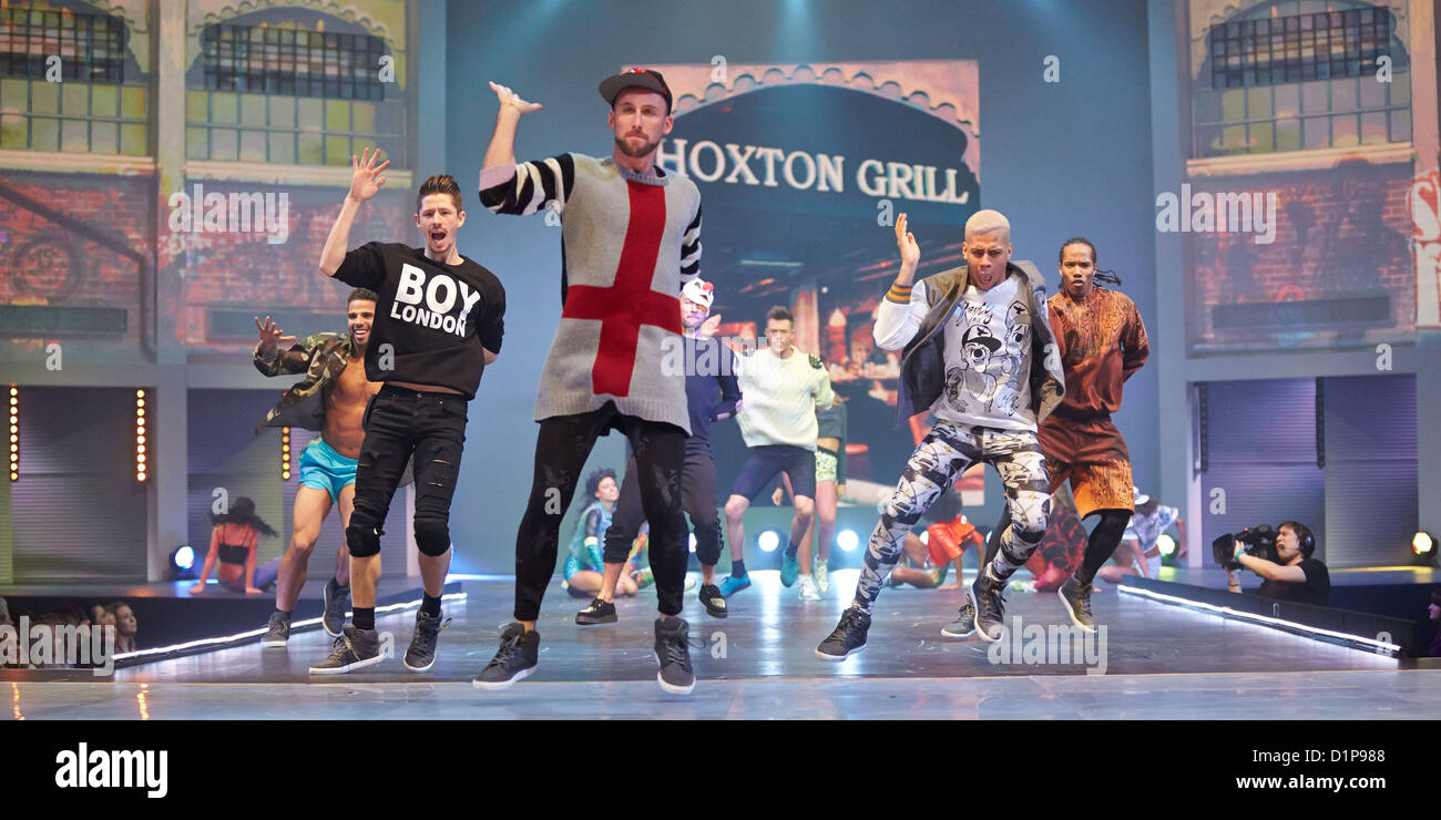 Male dancers perform during the Fashion Theatre show at the Clothes ...