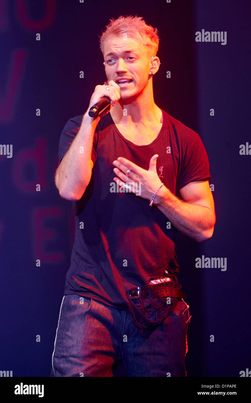 Luke White (pictured) from boyband Times Red performs during the ...
