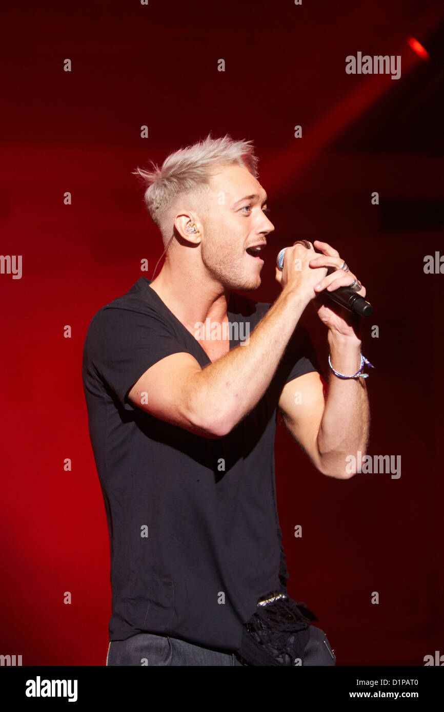 Luke White (pictured) from boyband Times Red performs during the ...
