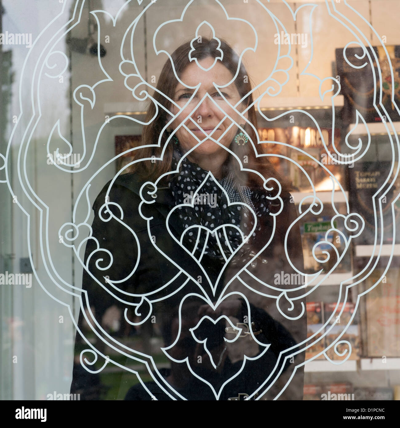 Woman behind a painted glass in Topkapi Palace, Istanbul, Turkey Stock ...