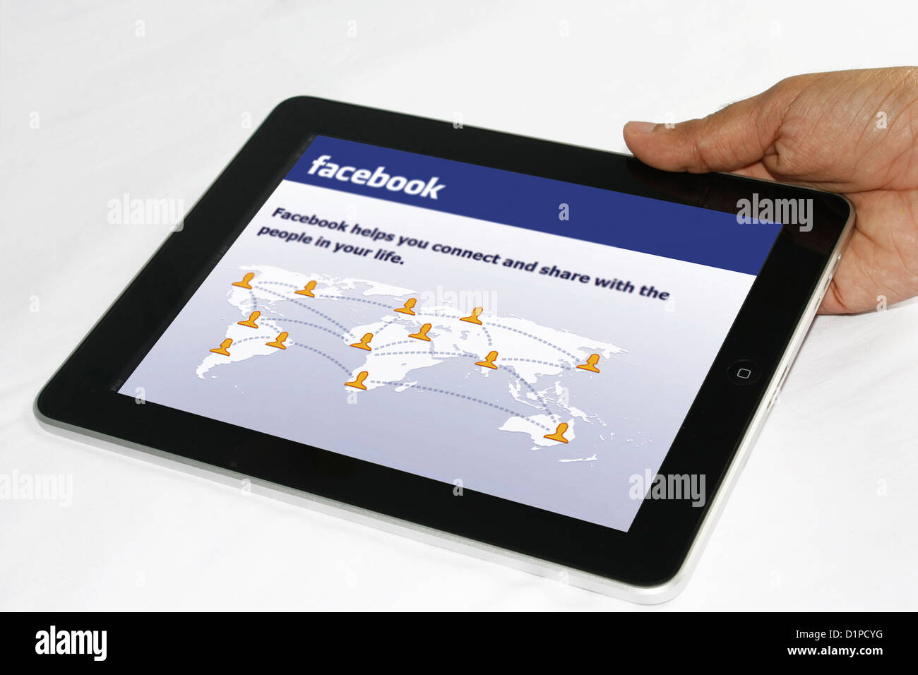 A person using Apple iPad tablet computer Stock Photo - Alamy