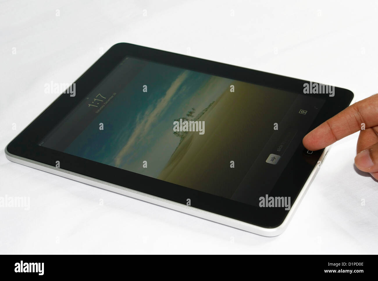 A person using Apple iPad tablet computer Stock Photo - Alamy