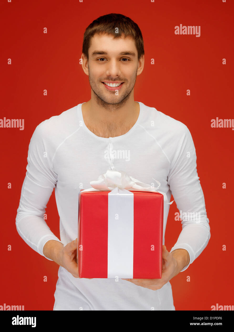 handsome man with a gift Stock Photo - Alamy