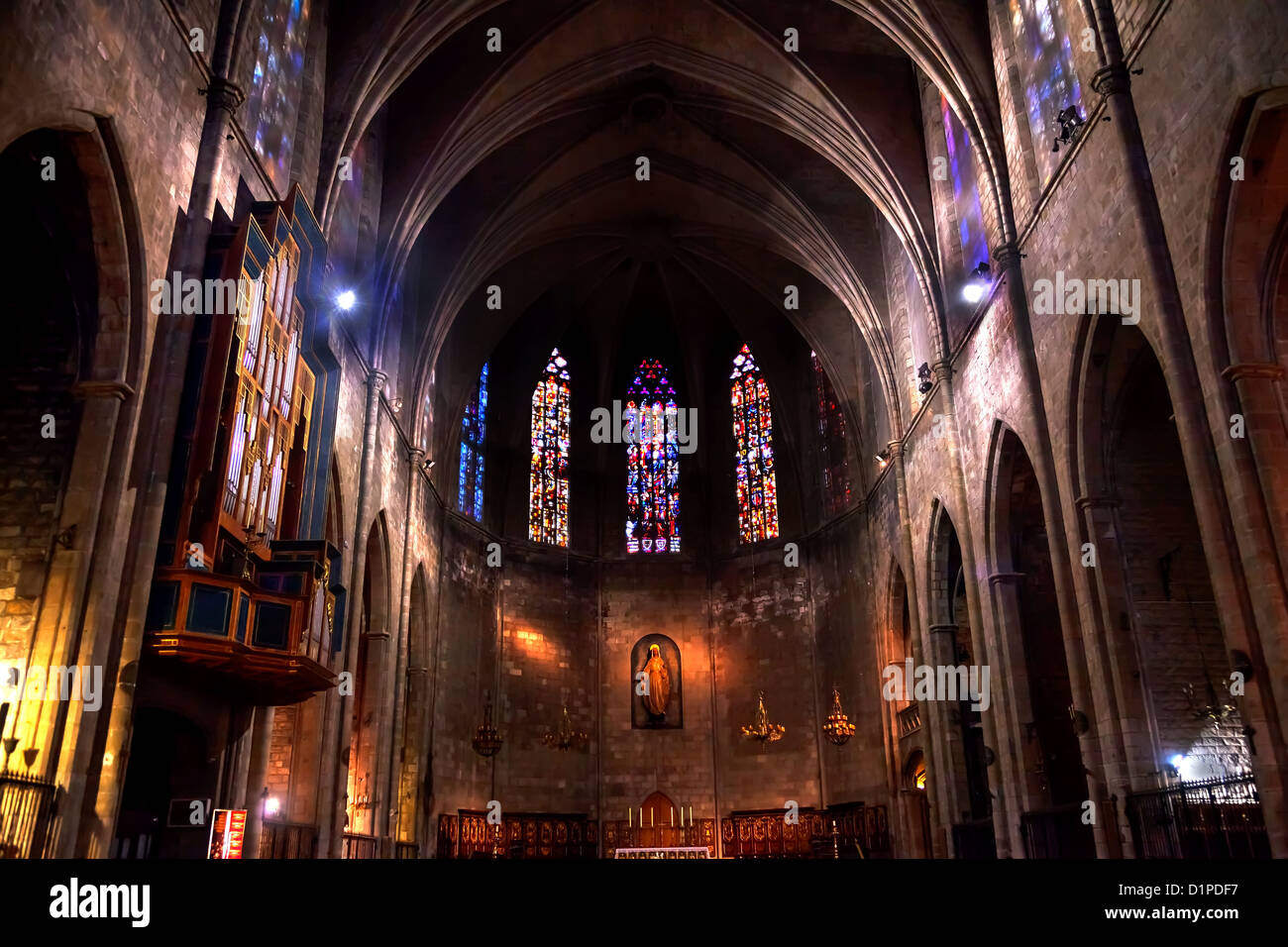 Stained Windows and Mary Statue in Old Stone Basilica, St Maria del Pi ...