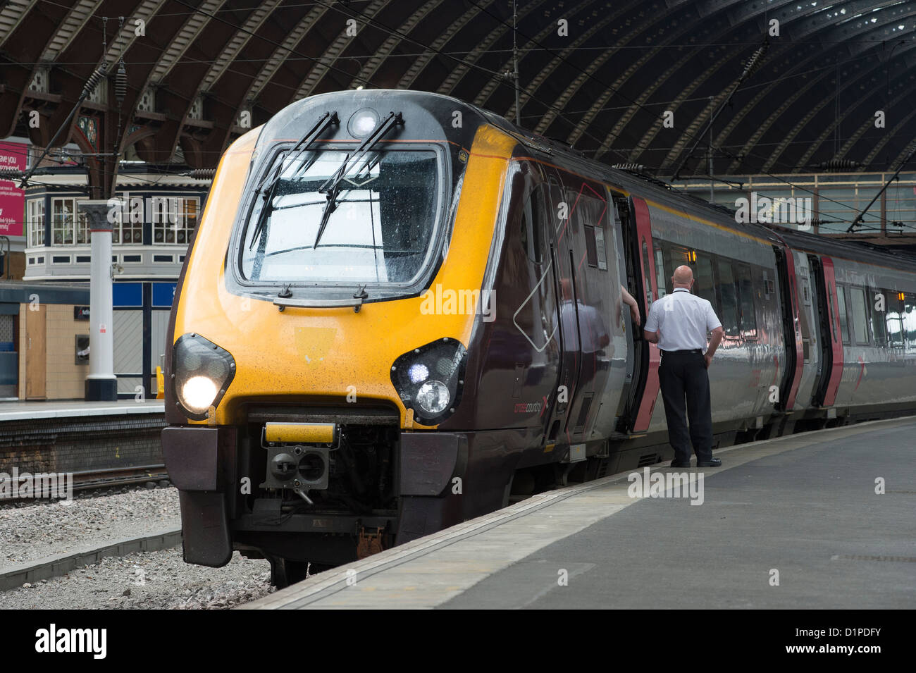 Class 220 Voyager passenger train in CrossCountry livery waiting at a ...