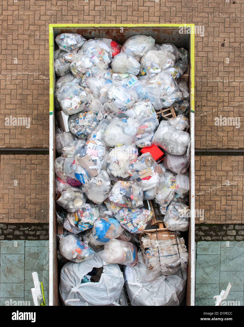 Rubbish ready for recycling in the skip. View from above top. Close up ...