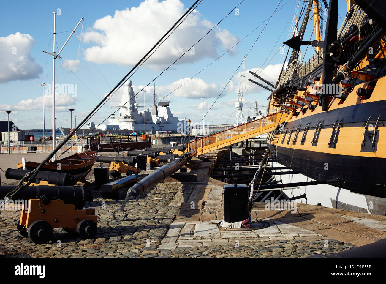 HMS Victory at Portsmouth dockyard with modern Frigate in background ...