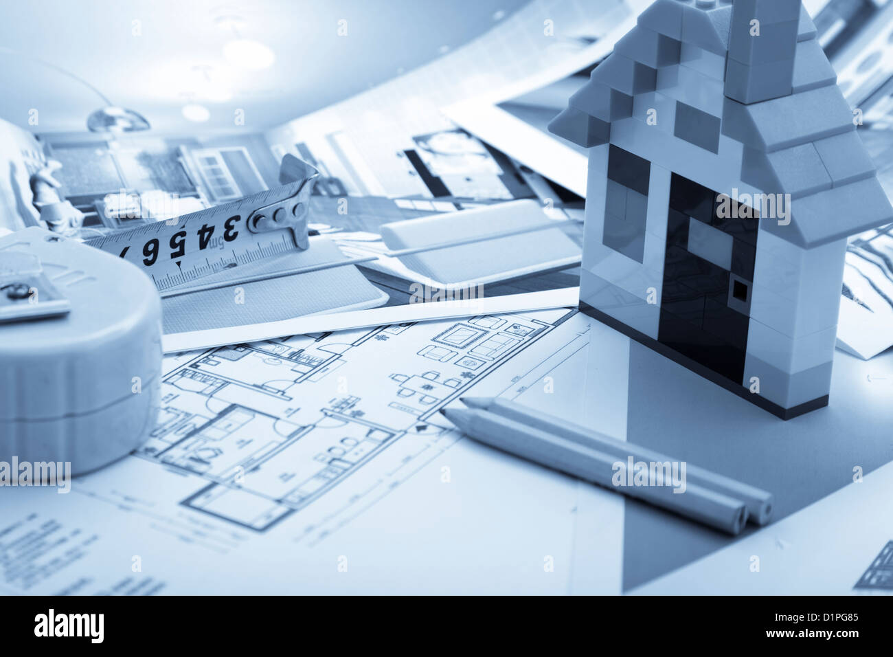 Home Improvement plan with pencils, house model and ruler Stock Photo ...