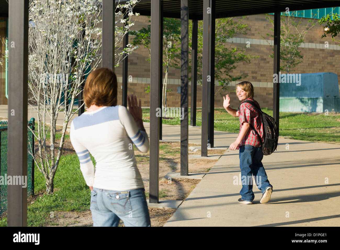 Waving goodbye to family hi-res stock photography and images - Alamy