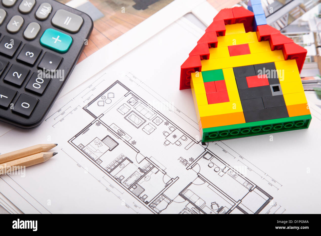 Home Improvement plan with pencils, house model and color samples Stock ...