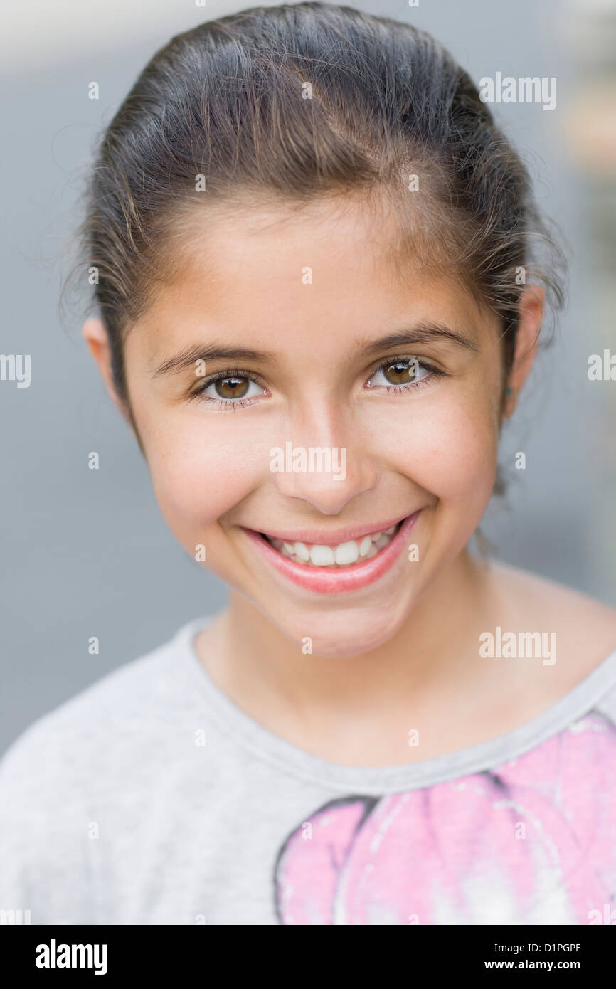 Smiling Hispanic girl Stock Photo - Alamy