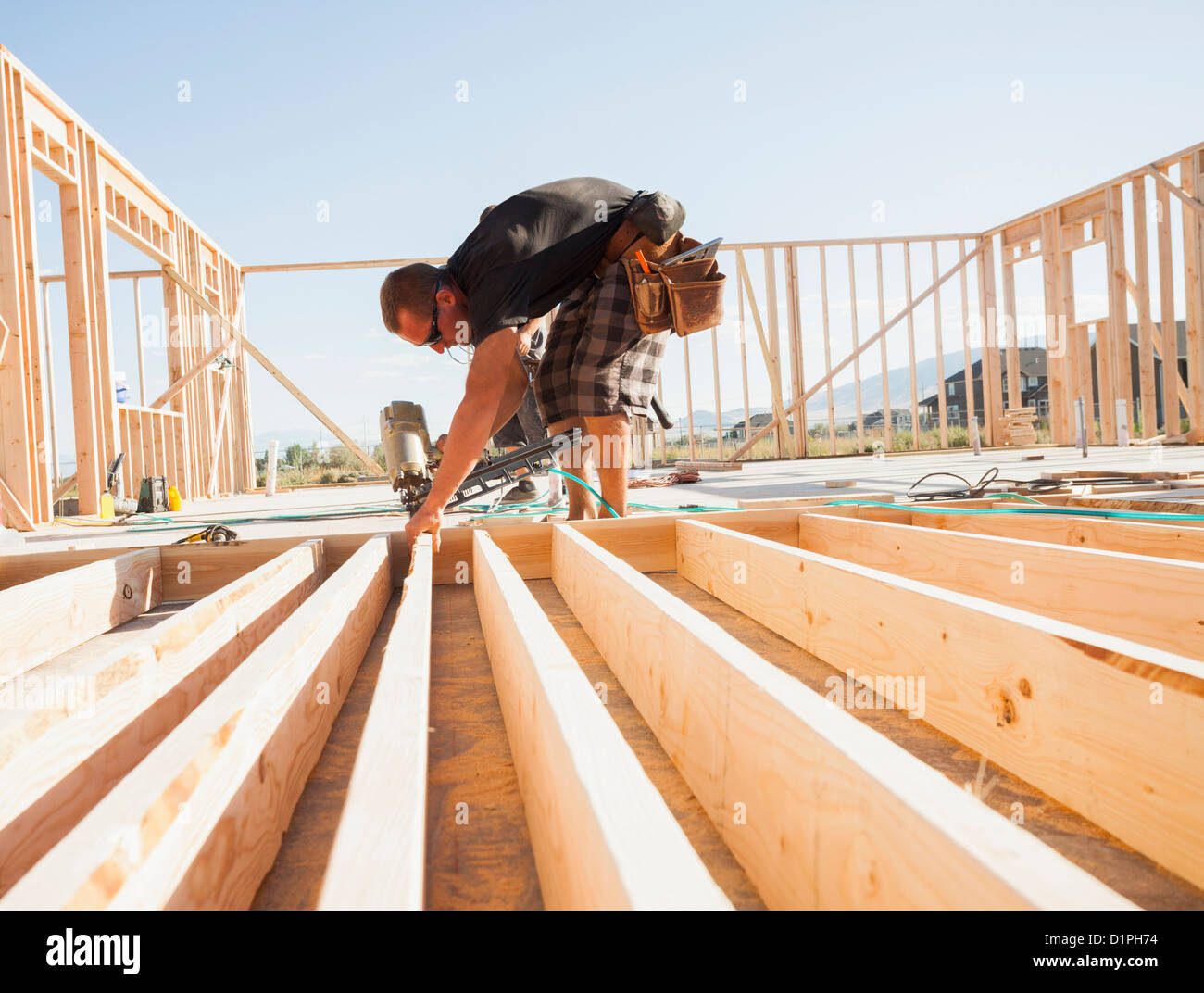 Man using nail gun hi-res stock photography and images - Alamy