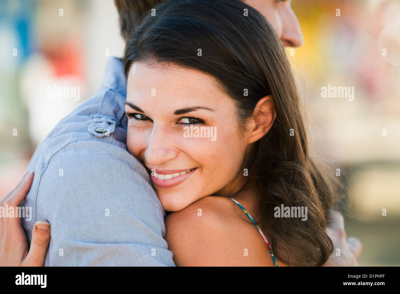 Caucasian couple hugging Stock Photo - Alamy