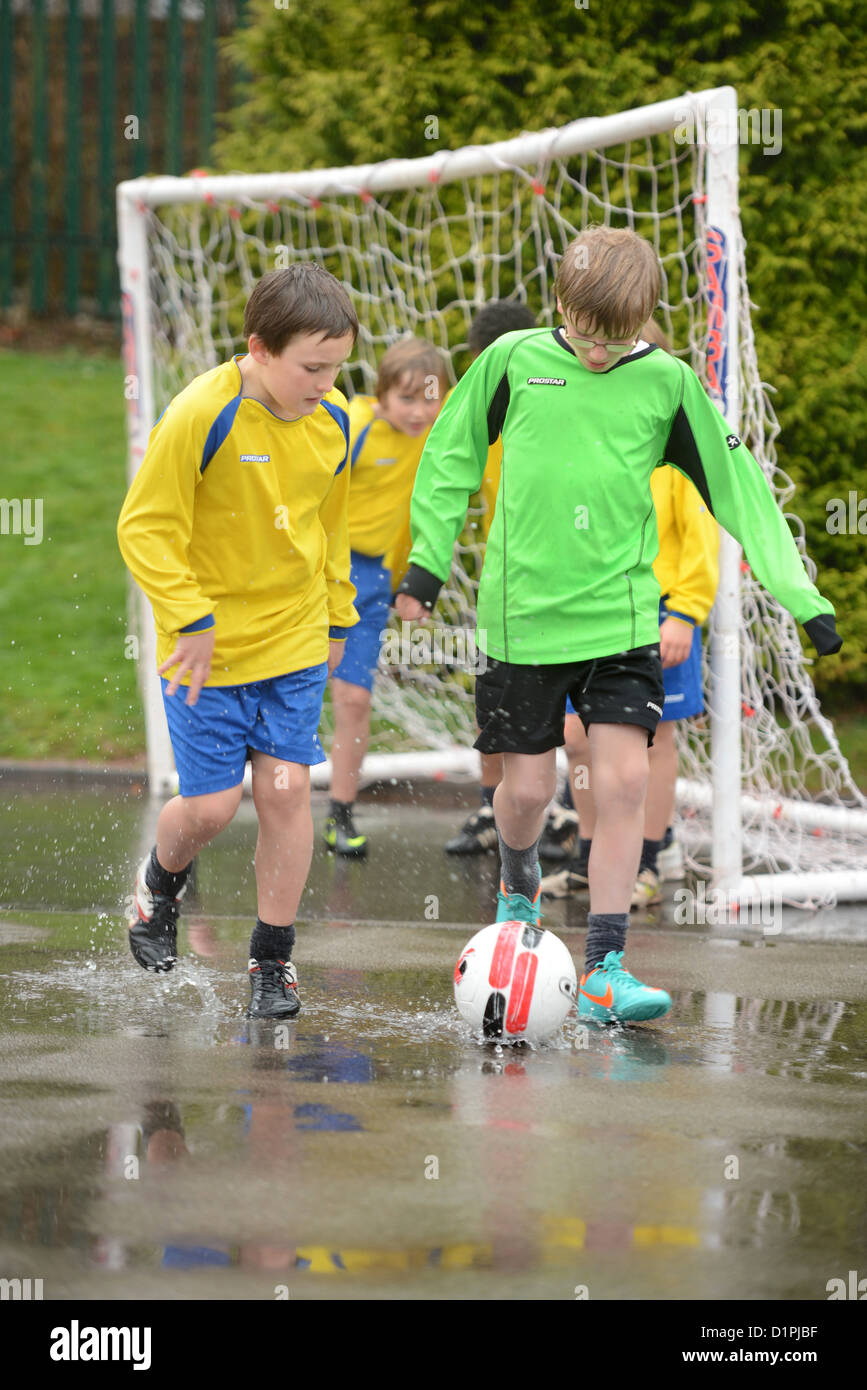 Children playing football school uk High Resolution Stock Photography ...