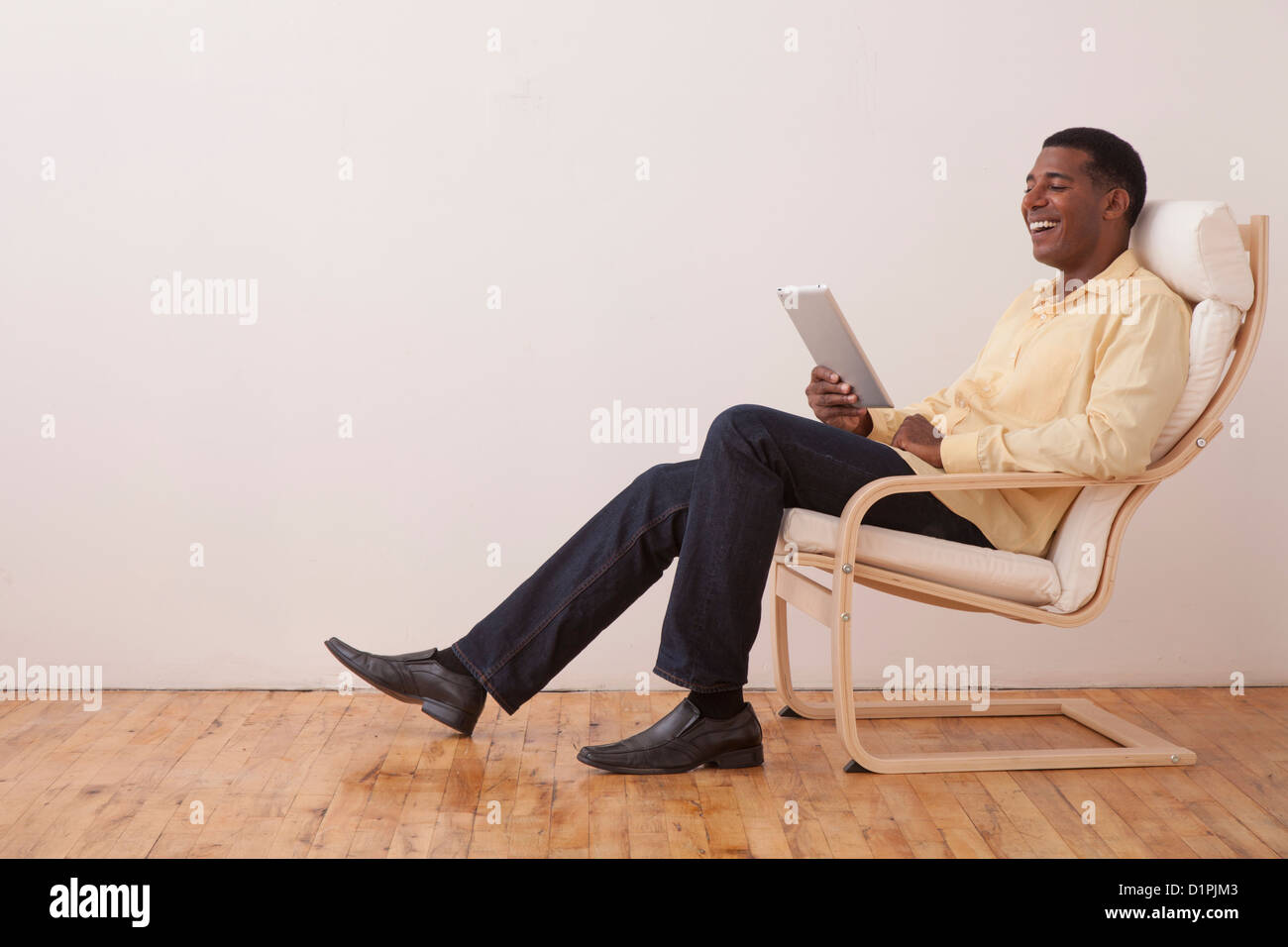Black man using digital tablet Stock Photo - Alamy Black man using digital tablet Stock Photo - Alamy