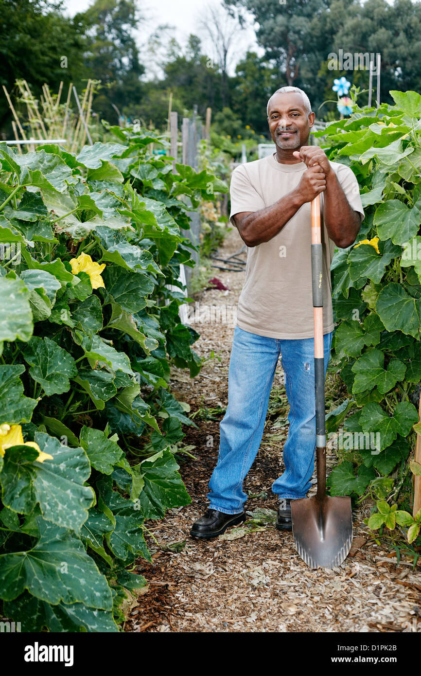Happy man shovel hi-res stock photography and images - Alamy