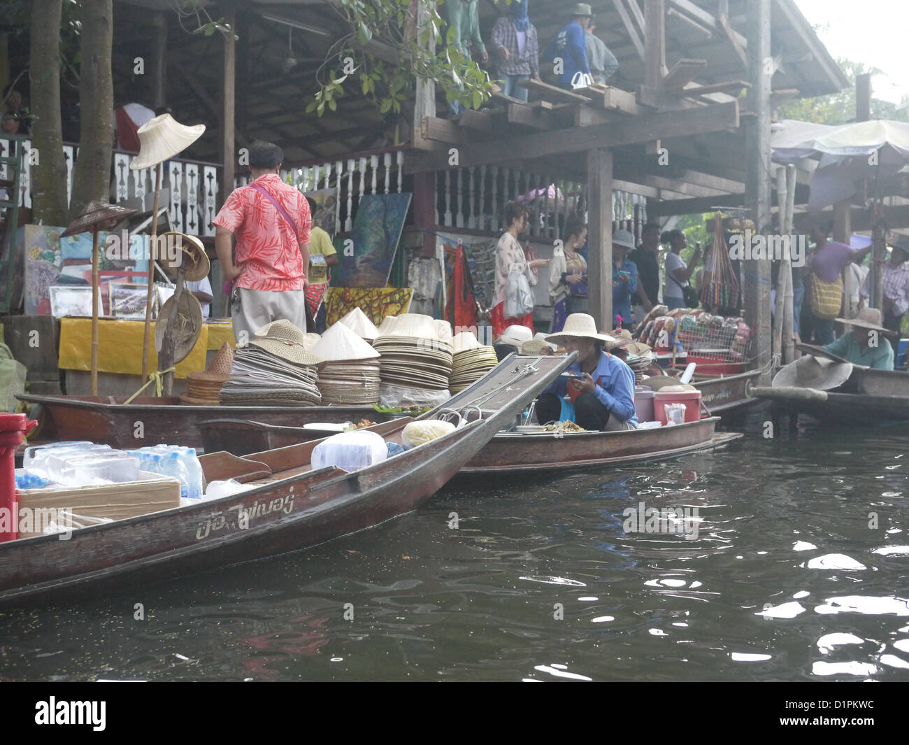 Thailand floating market boat vendor Stock Photo - Alamy