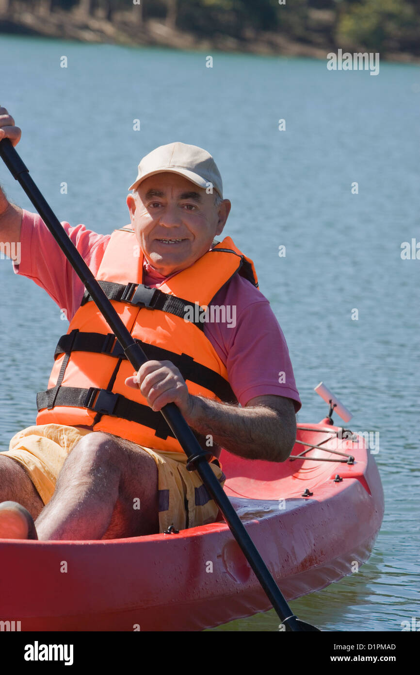 Three men on kayak hi-res stock photography and images - Alamy