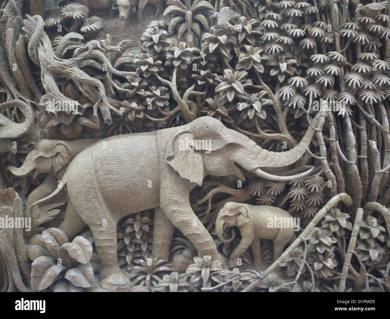 wooden elephant carving oriental art Stock Photo - Alamy