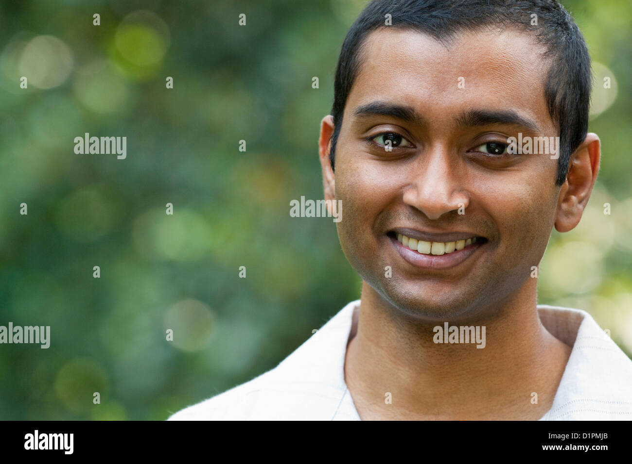 Smiling young indian guy hi-res stock photography and images - Alamy