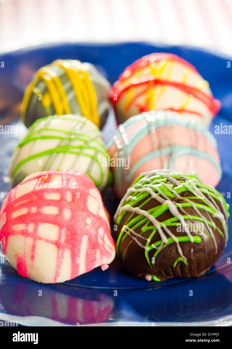 Cake balls on a plate at a bakery Stock Photo - Alamy