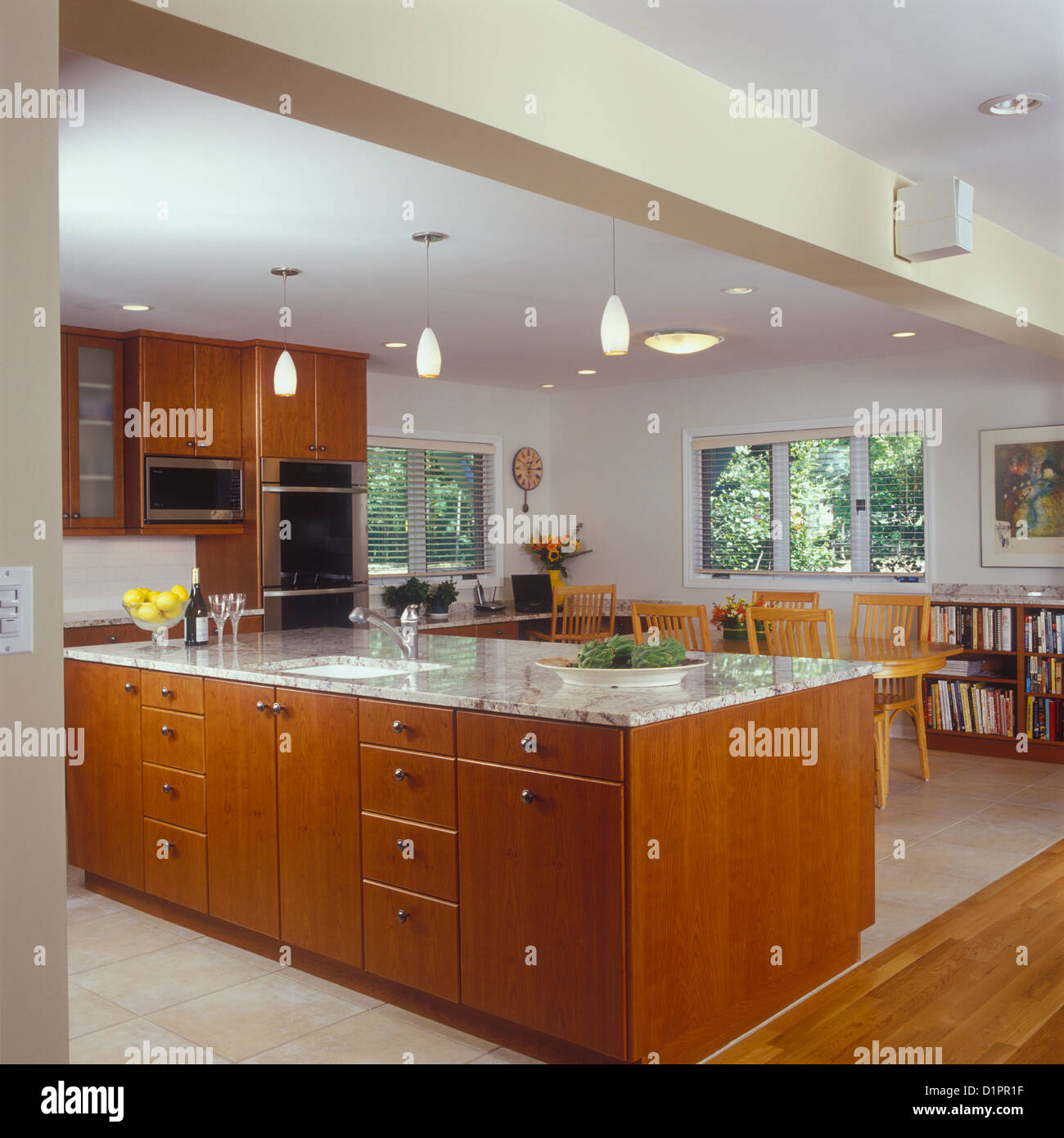 KITCHENS View towards island counter and family eating area rich cherry ...