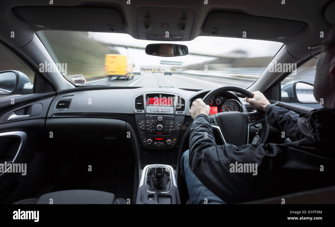 Driving fast down a motorway from inside the car Stock Photo - Alamy