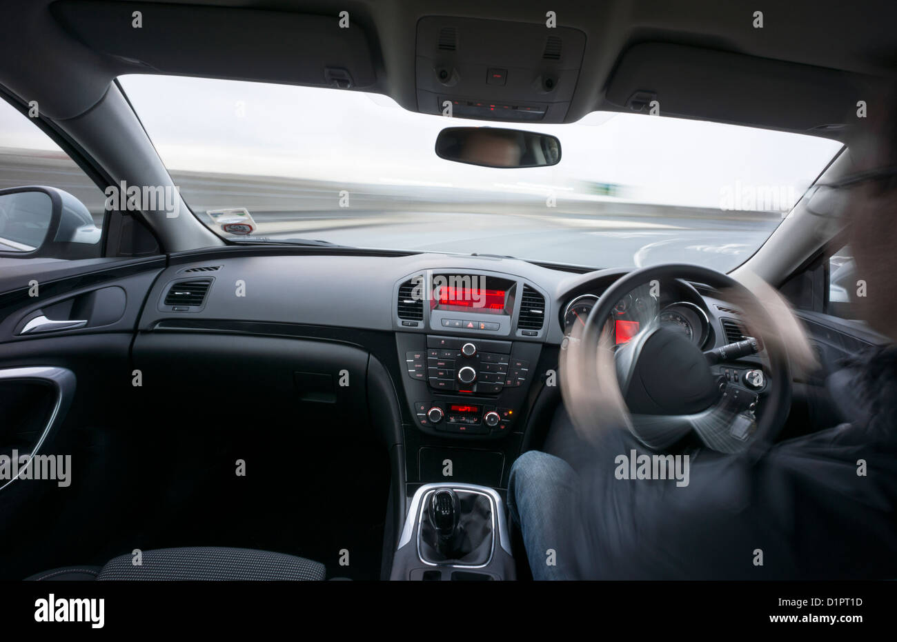 Car turning corner uk street hi-res stock photography and images - Alamy
