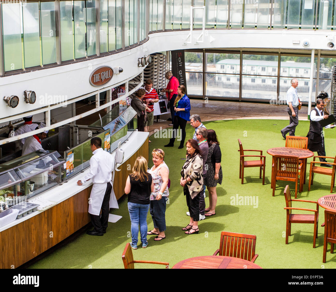 Cruise ship passengers lining up for lunch at grill Stock Photo - Alamy