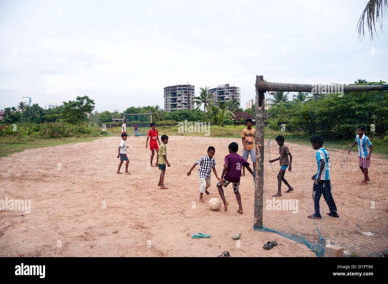 Children playing football in rural village cochin, India Stock Photo ...