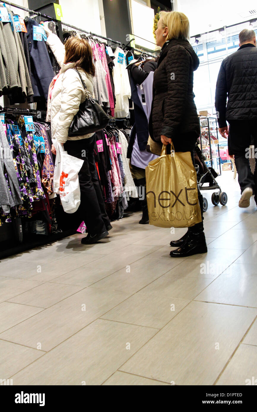 Boxing day shopping in Next Stock Photo - Alamy