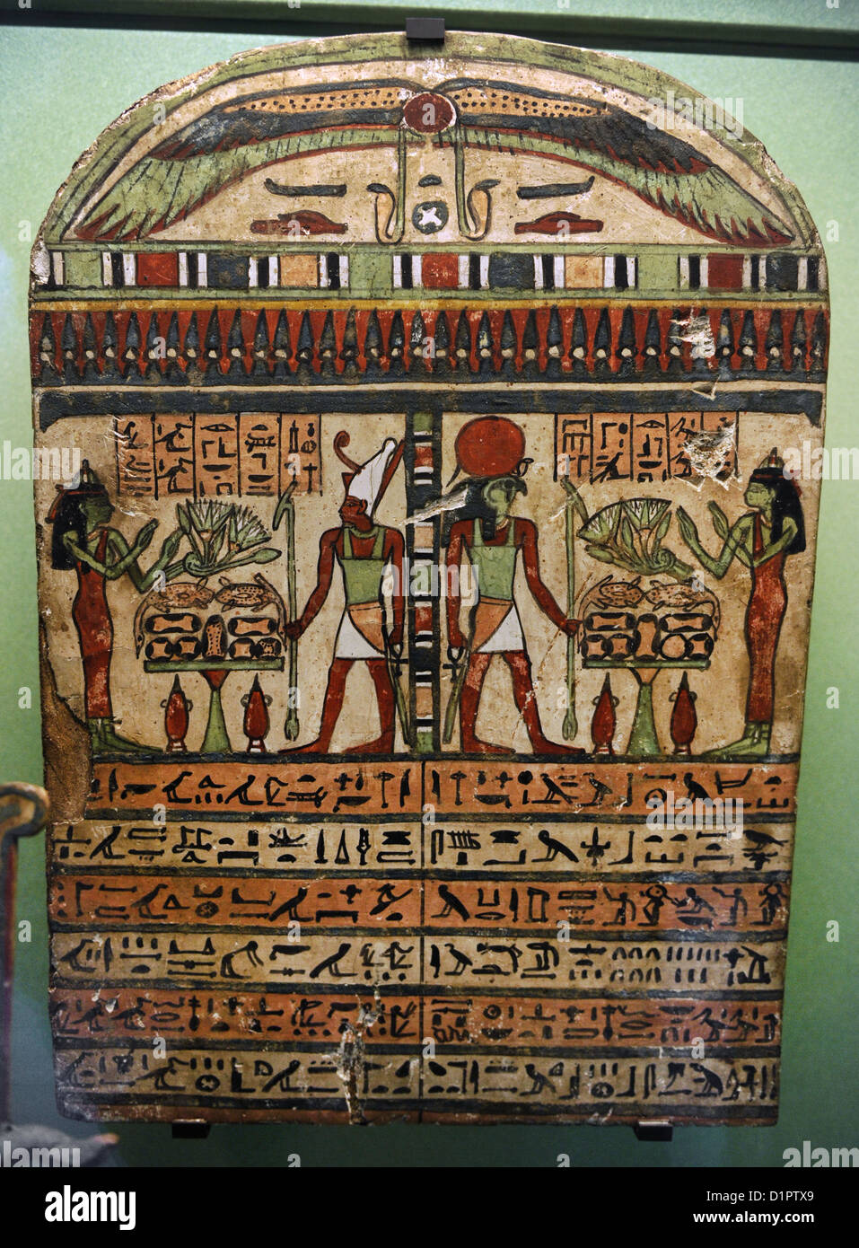 Egypt. Funerary stela. Wood. Baba praying to the sun gods Atum (left ...