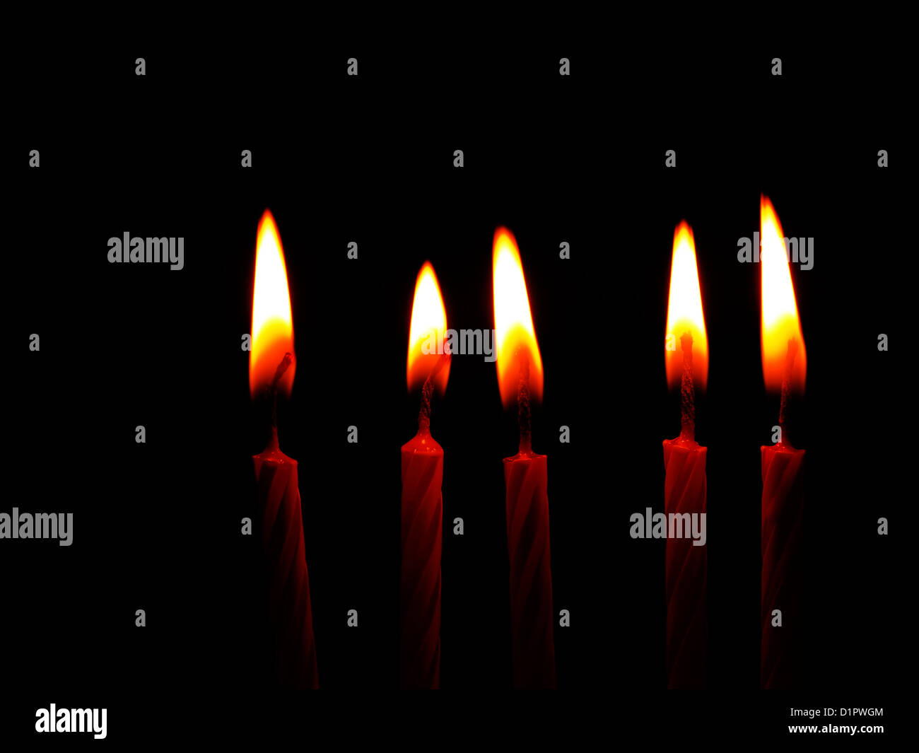 Five red candles burning hi-res stock photography and images - Alamy
