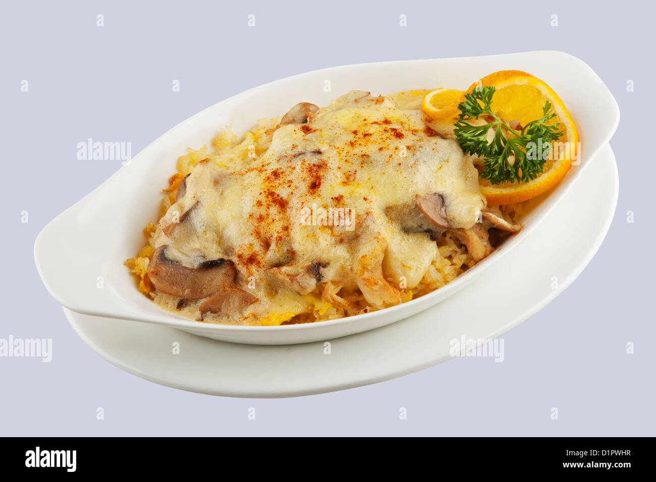 Chicken and rice severed covered with a delicious mushroom sauce with a ...