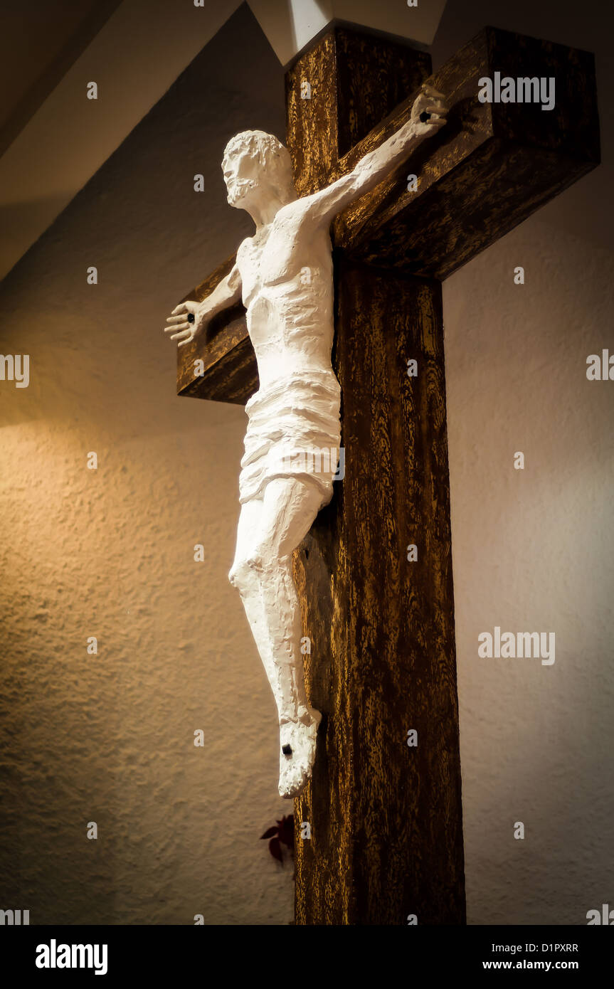 A wooden and plaster crucifix in a spanish church Stock Photo - Alamy