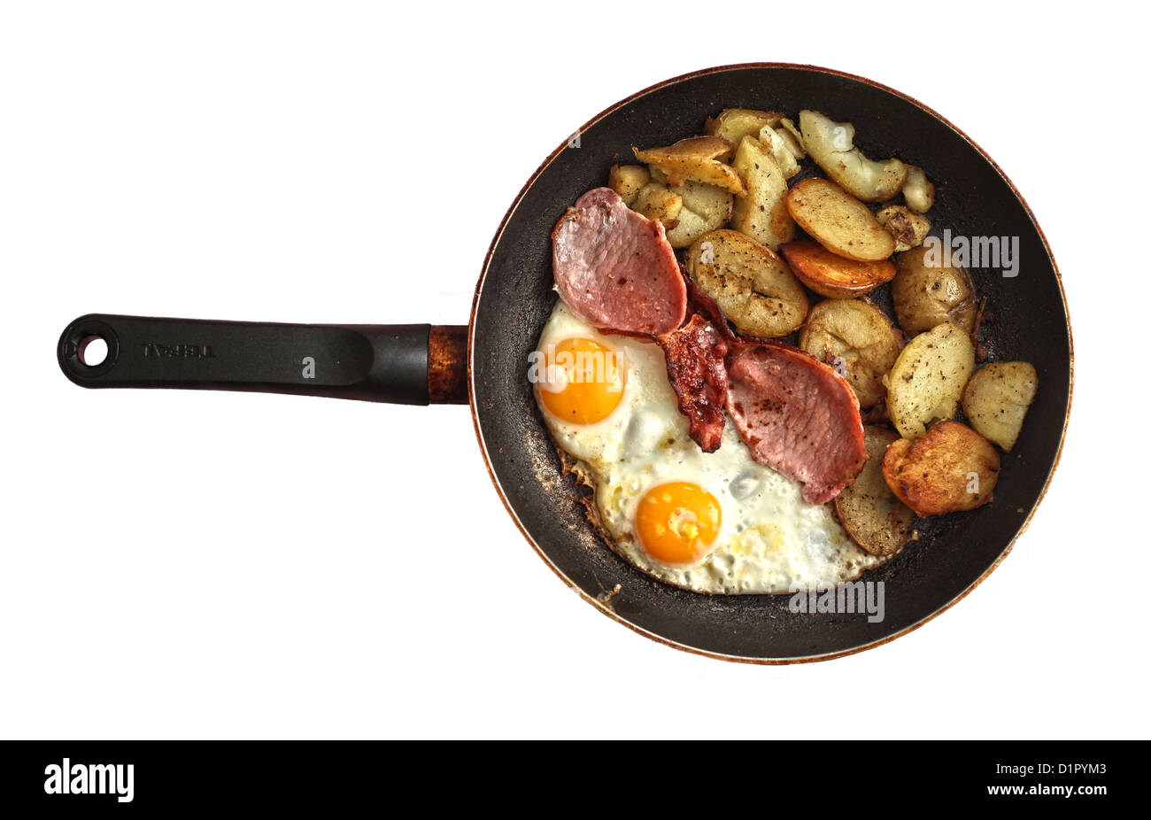 Bacon eggs cooking in Cut Out Stock Images & Pictures - Alamy