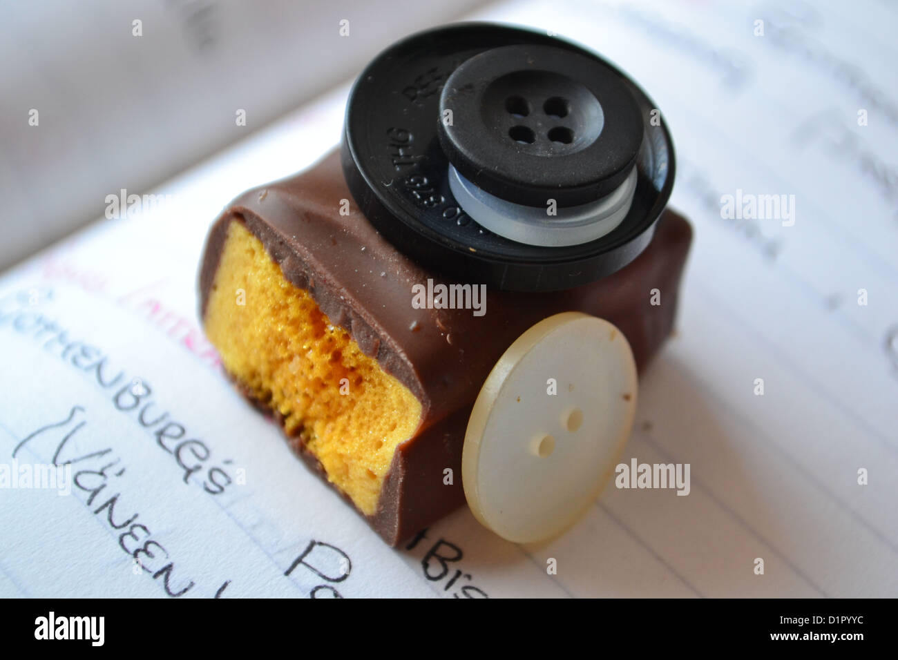 Milk chocolate button buttons hi-res stock photography and images - Alamy
