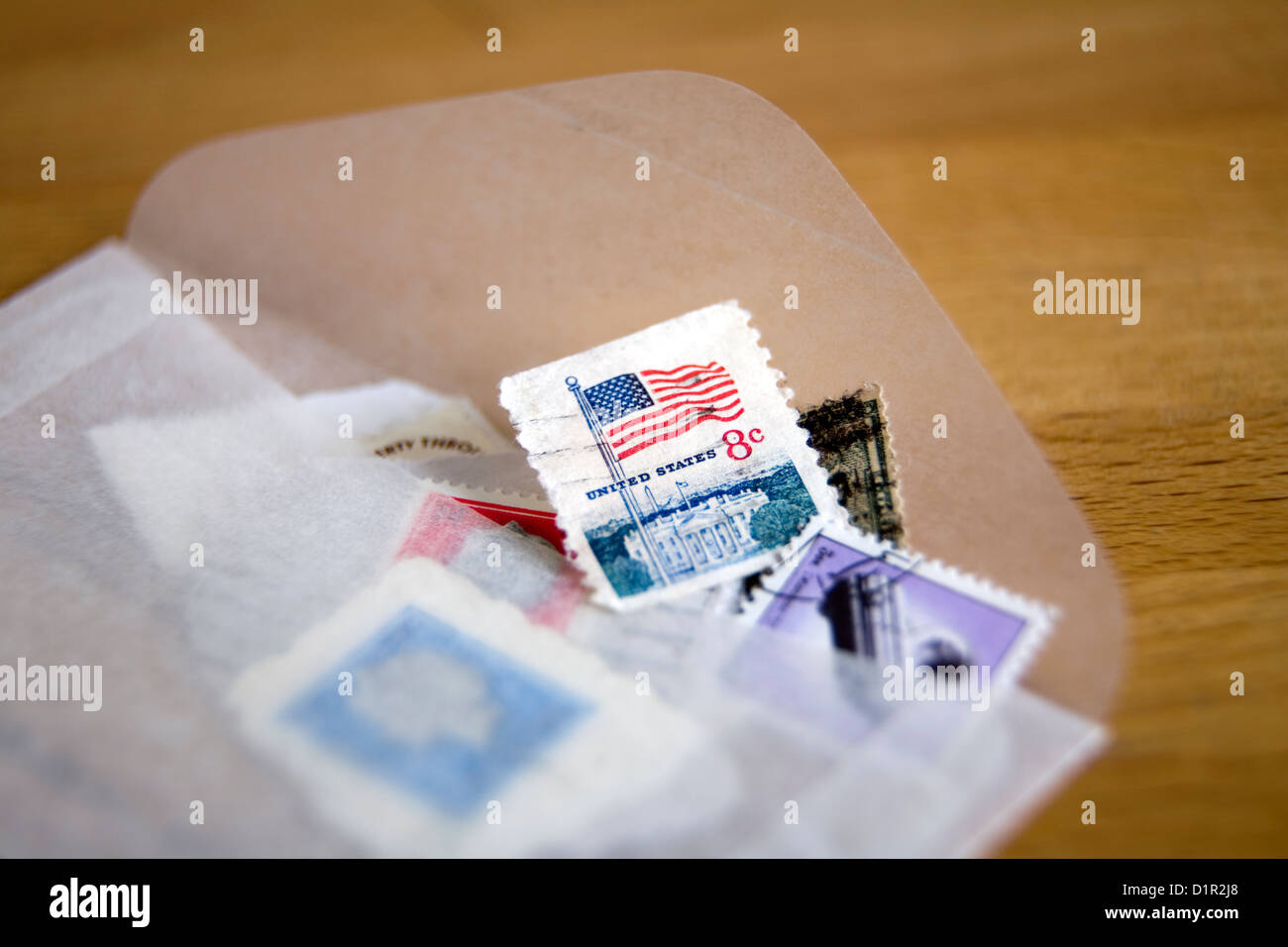 Postage Stamps in Glassine Envelope Stock Photo - Alamy