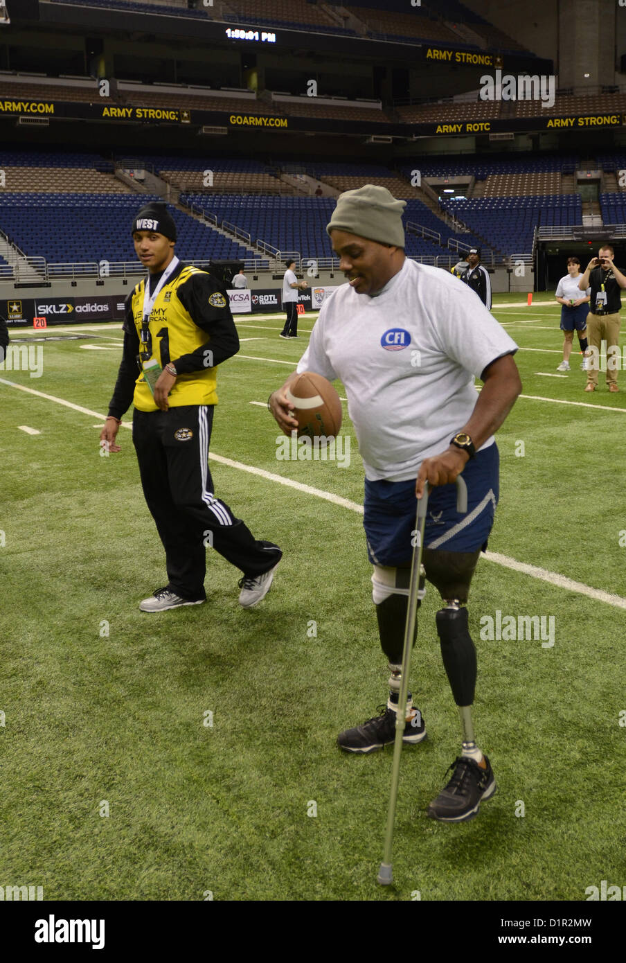 U.S. Air Force Master Sgt. participates in a football throwing ...