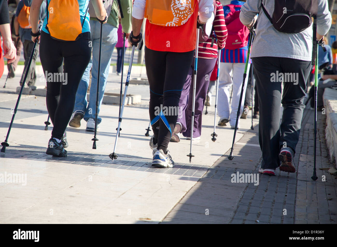 Nordic walking group of people Stock Photo - Alamy