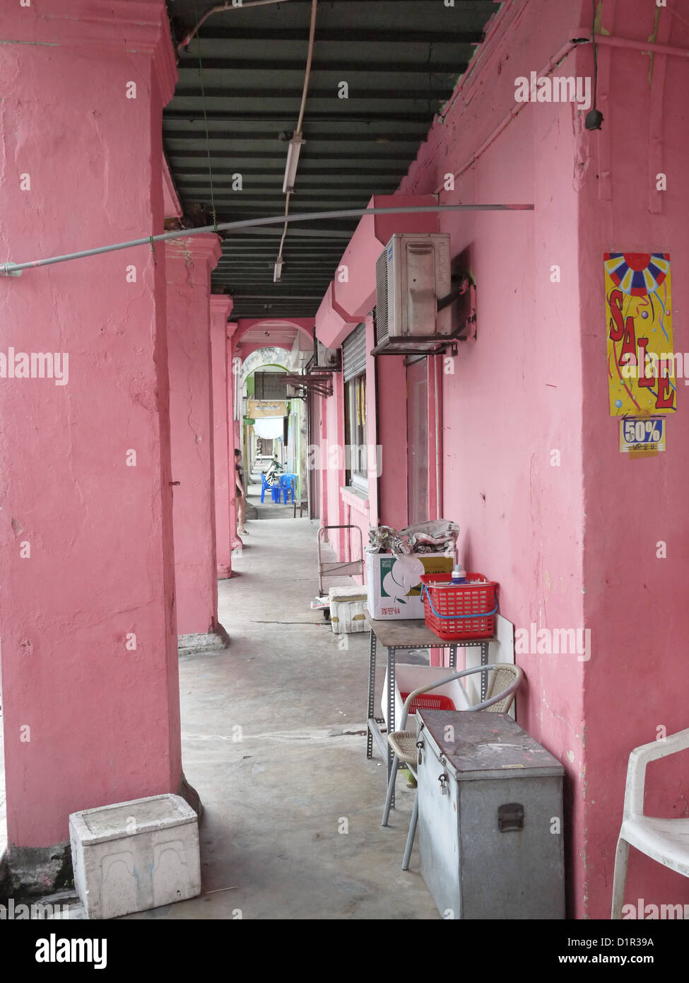 pink wall Asian street Stock Photo - Alamy