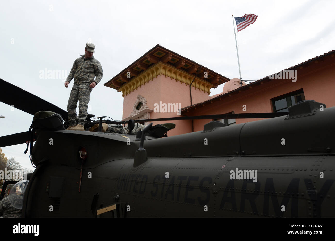 Soldiers from Company F, 7-158th Aviation Regiment secure a UH-60 ...