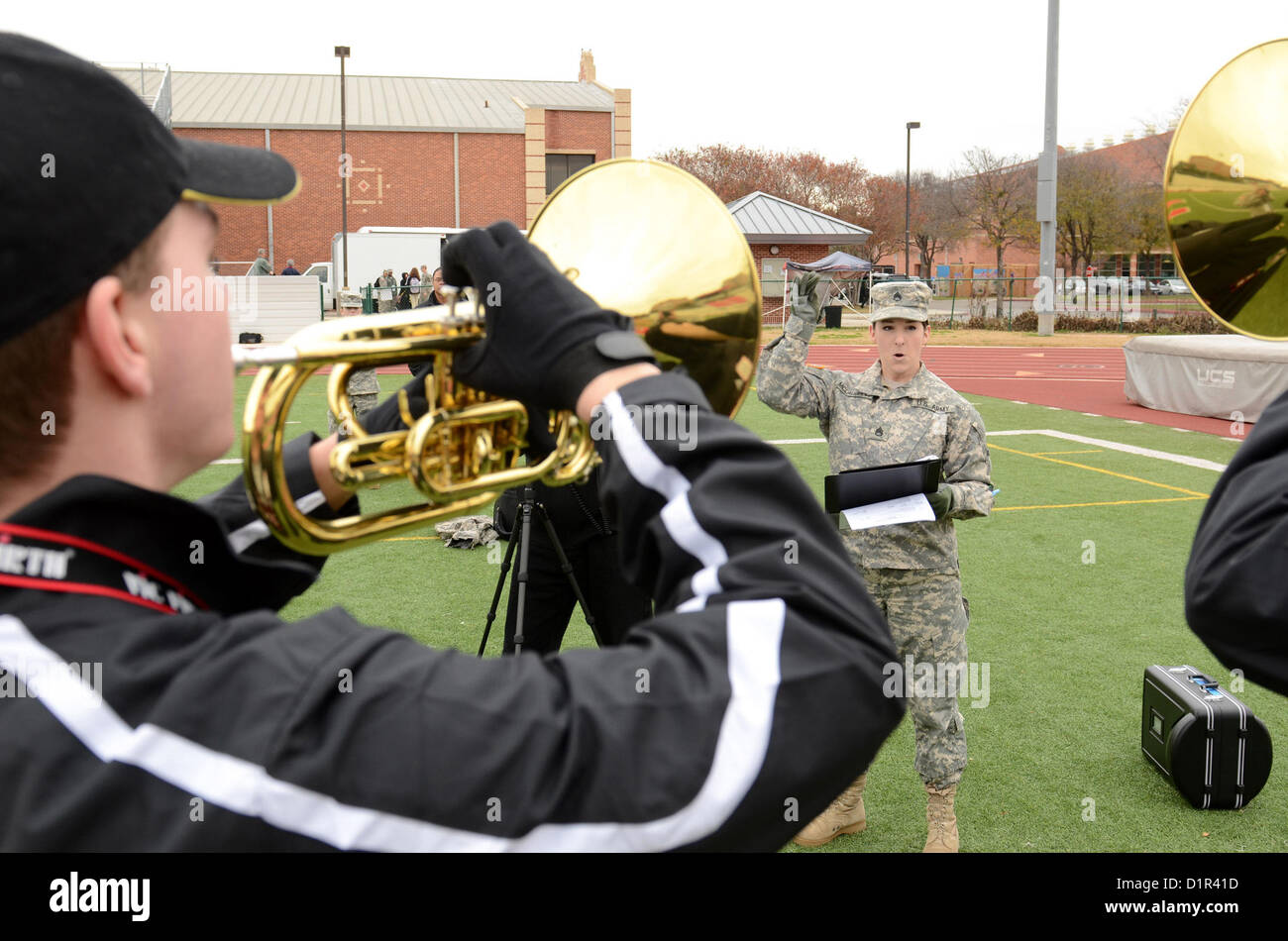 Staff Sgt. Becky McLaughlin conducts the U.S. All-American Band at ...