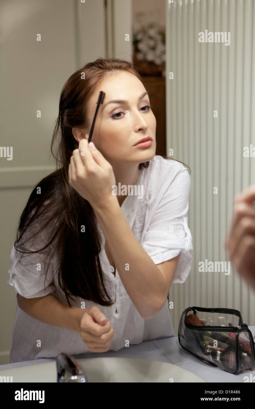 woman in the mirror getting their makeup Stock Photo - Alamy