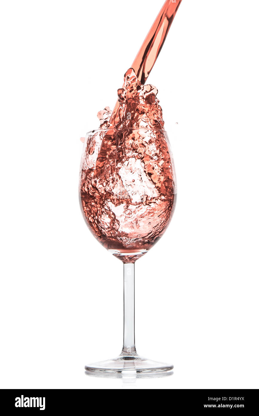 rose wine splashing on white background Stock Photo - Alamy