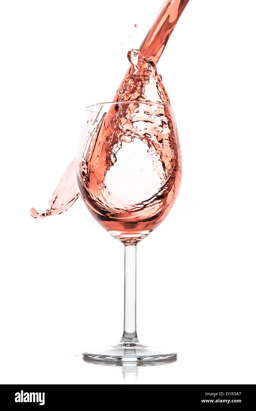 rose wine splashing on white background Stock Photo - Alamy