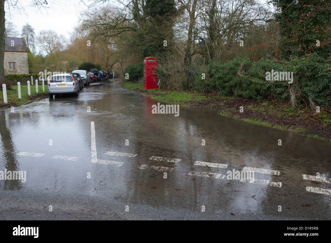 Swinbrook village with small flood Stock Photo - Alamy