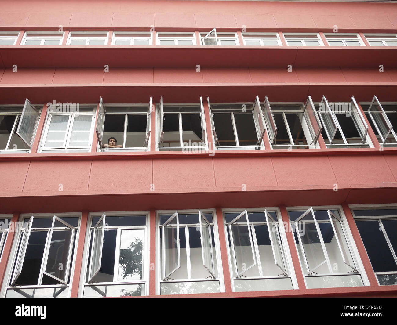 open window red wall building Stock Photo - Alamy
